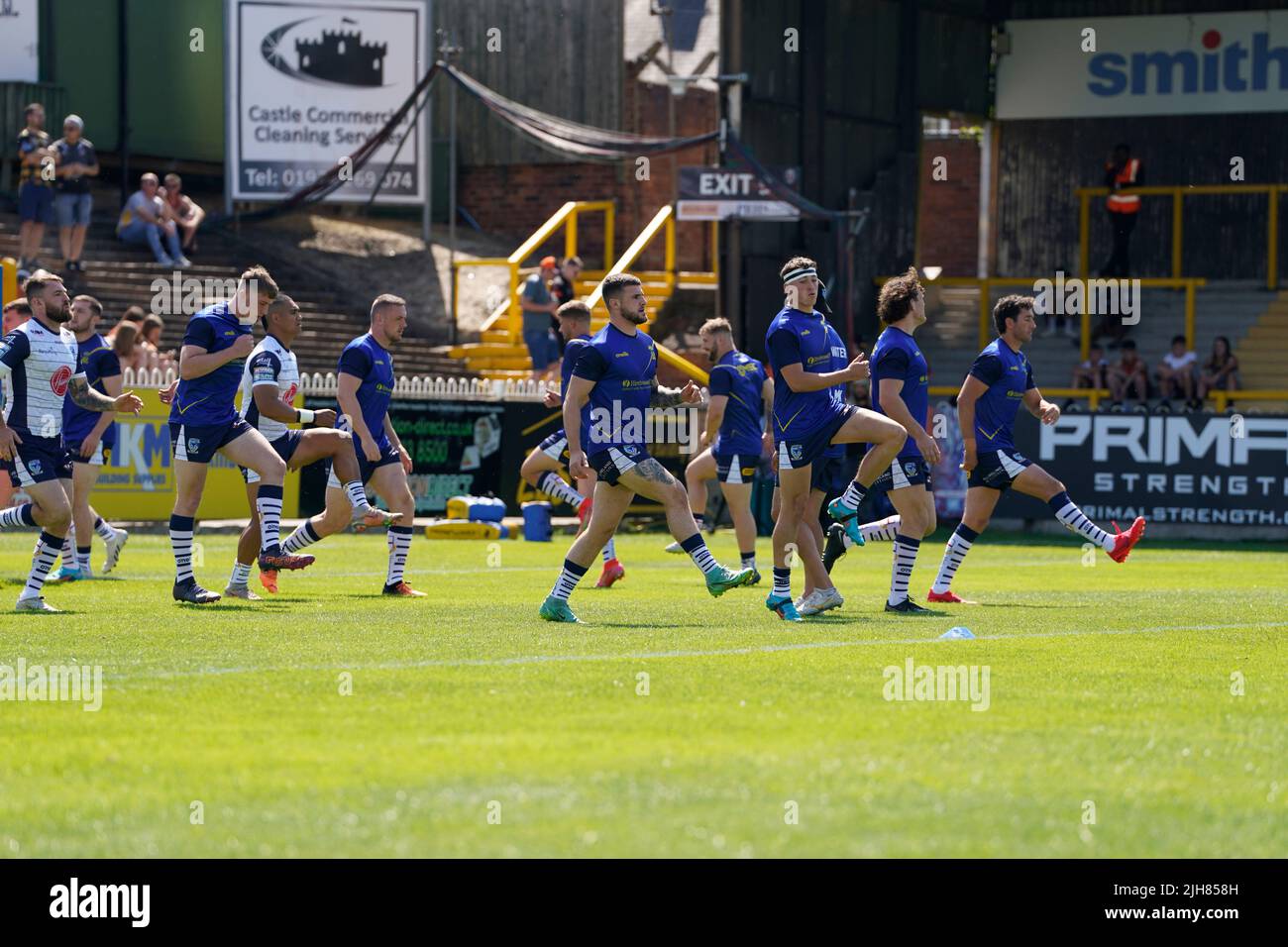 Warrington Wolves players warm up before the game Stock Photo - Alamy