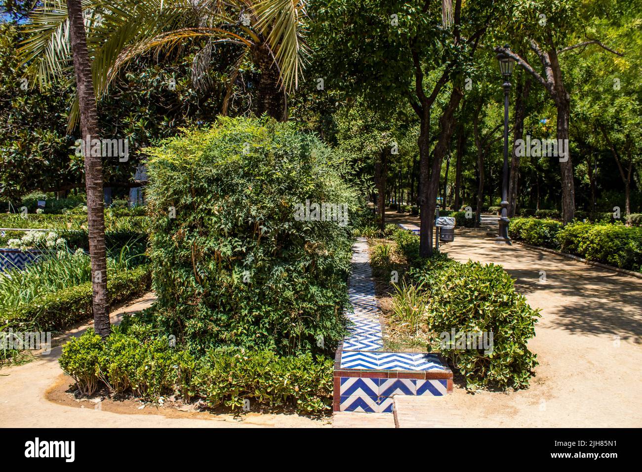 Seville, Spain - July 14, 2022 Maria Luisa Park is the first urban park ...