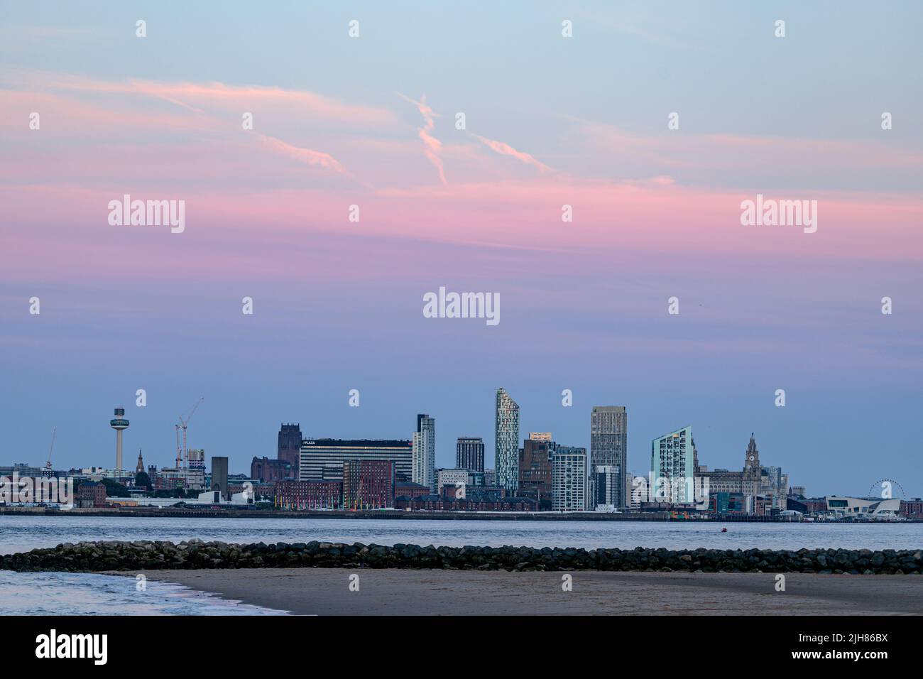 The Liverpool waterfront skyline at dusk, Merseyside, England Stock ...