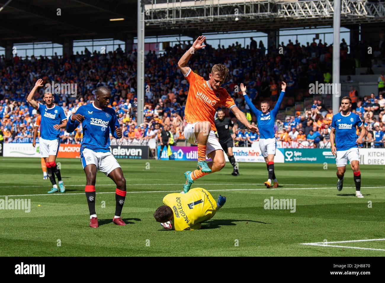 Allan McGregor #1 of Rangers collects the ball ahead of Callum Connolly ...
