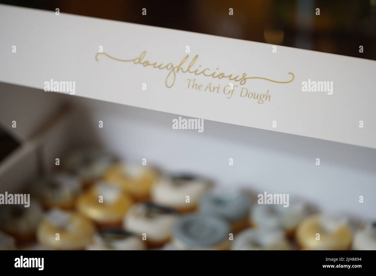 Graduation mini doughnuts for catering Stock Photo - Alamy