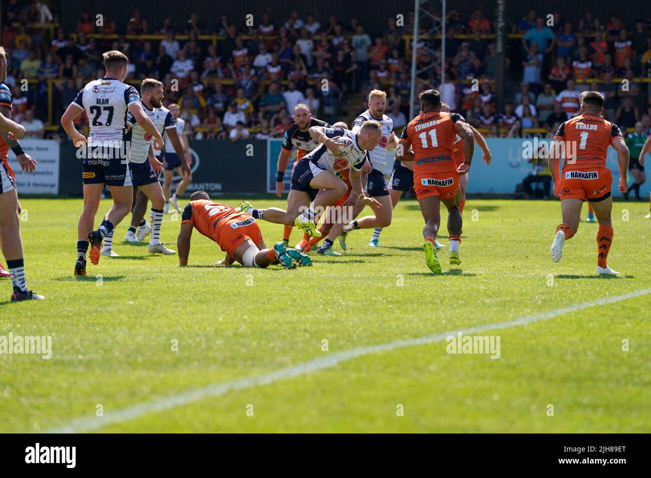 Jason Clark #14 of Warrington Wolves makes a break Stock Photo - Alamy