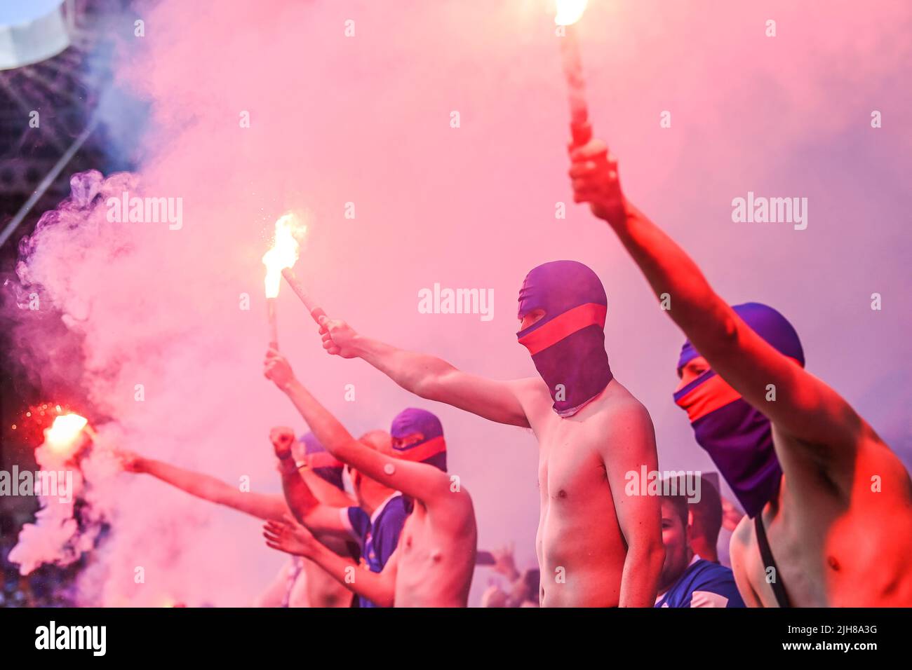 Rangers light flares and weak masks during the game Stock Photo - Alamy