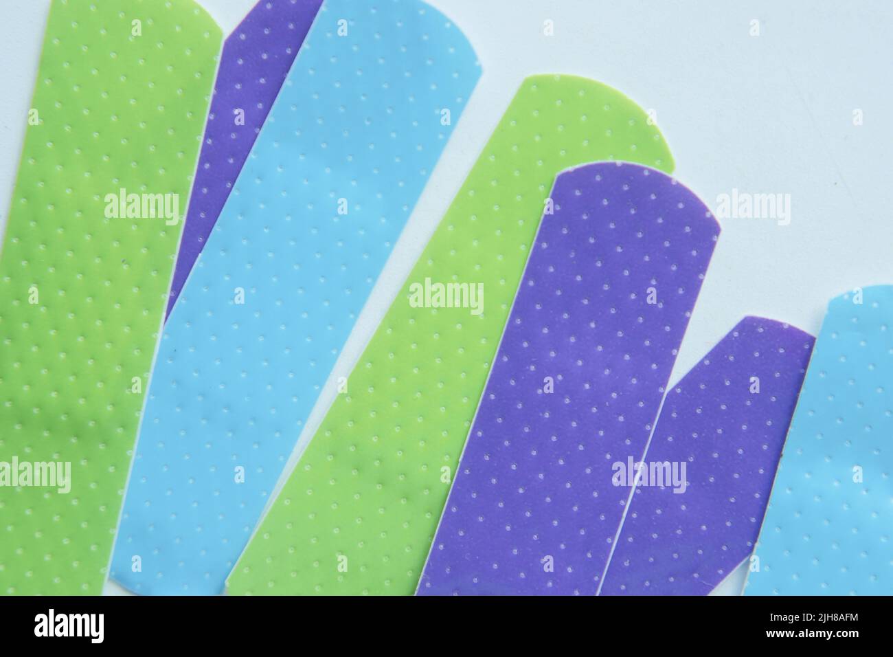 colorful adhesive bandage on white background Stock Photo - Alamy