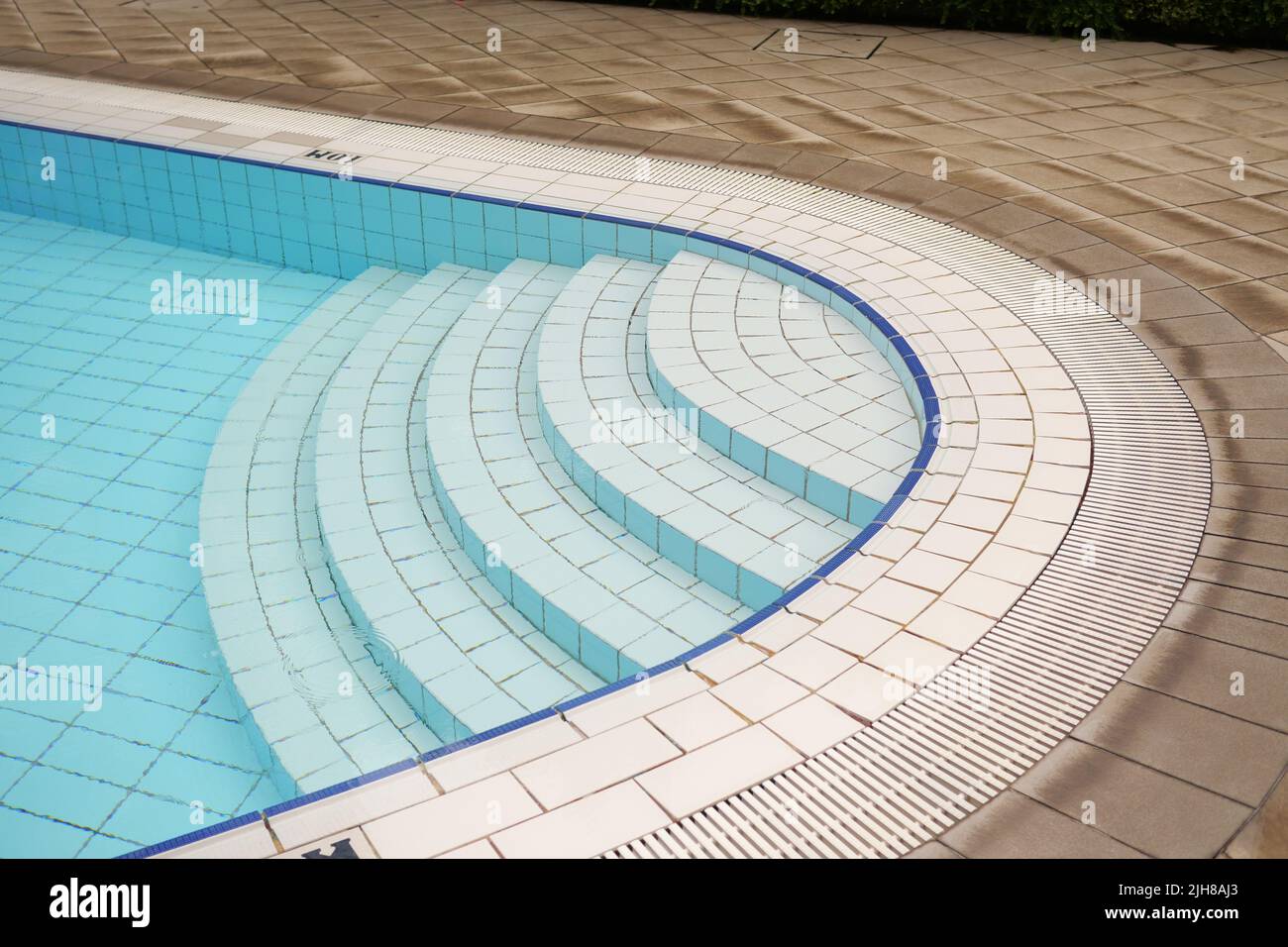 an empty swimming pool with poll stair Stock Photo - Alamy