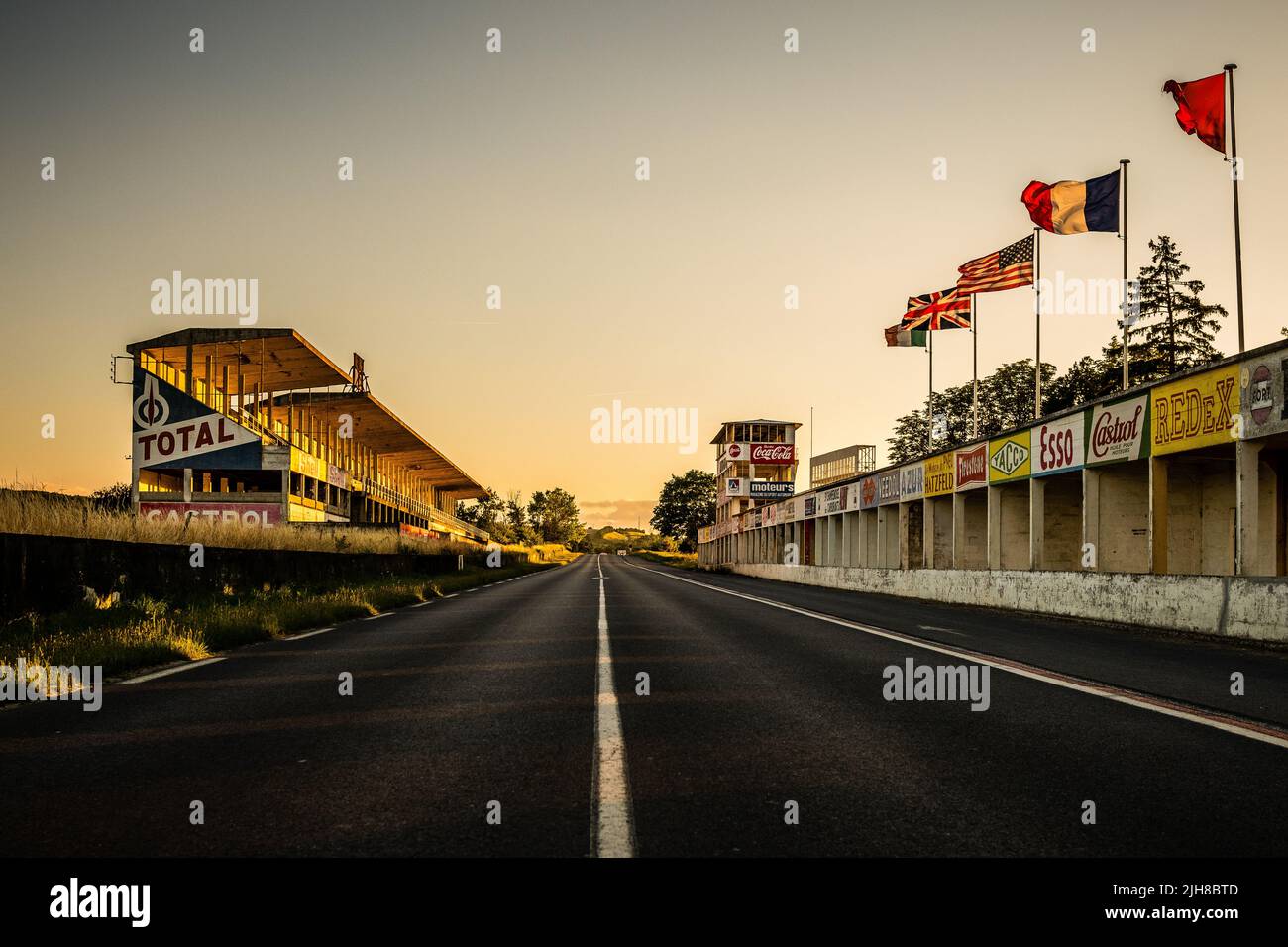 Old buildings, pit lane & grandstand of the abandoned race circuit ...