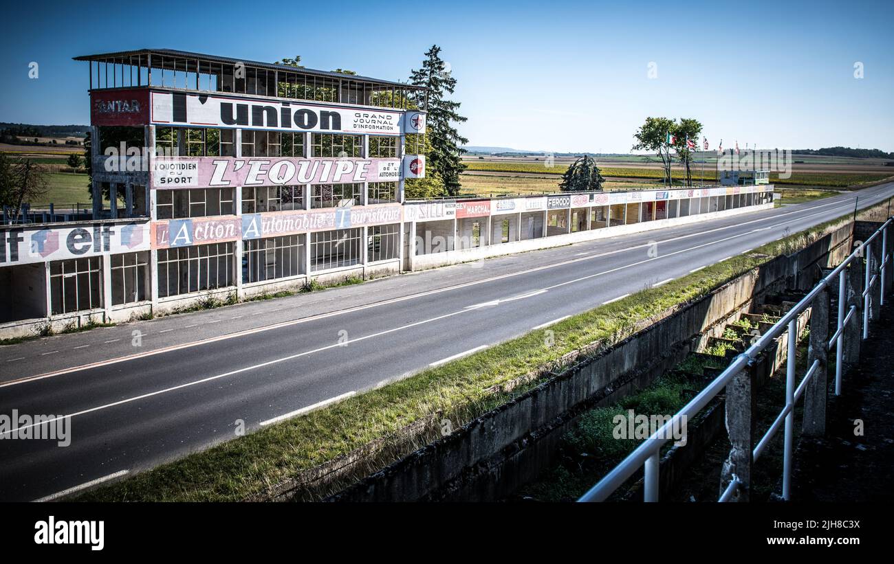 Old buildings, pit lane & grandstand of the abandoned race circuit ...