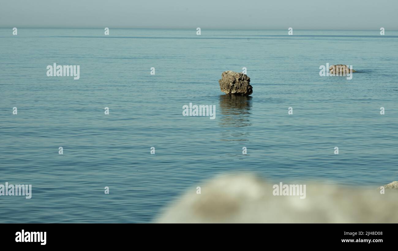 Image with open space and two objects at the right side. Good for ...