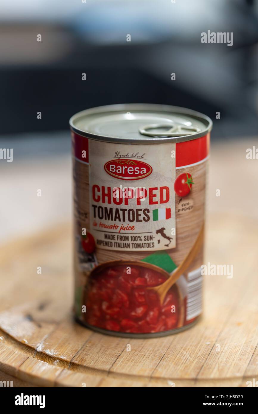 Chopped tomatoes in container hi-res stock photography and images - Alamy
