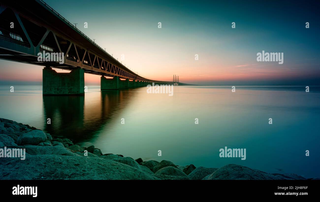 The sunrise view from the coast -The Oresund Bridge crossing over the ...