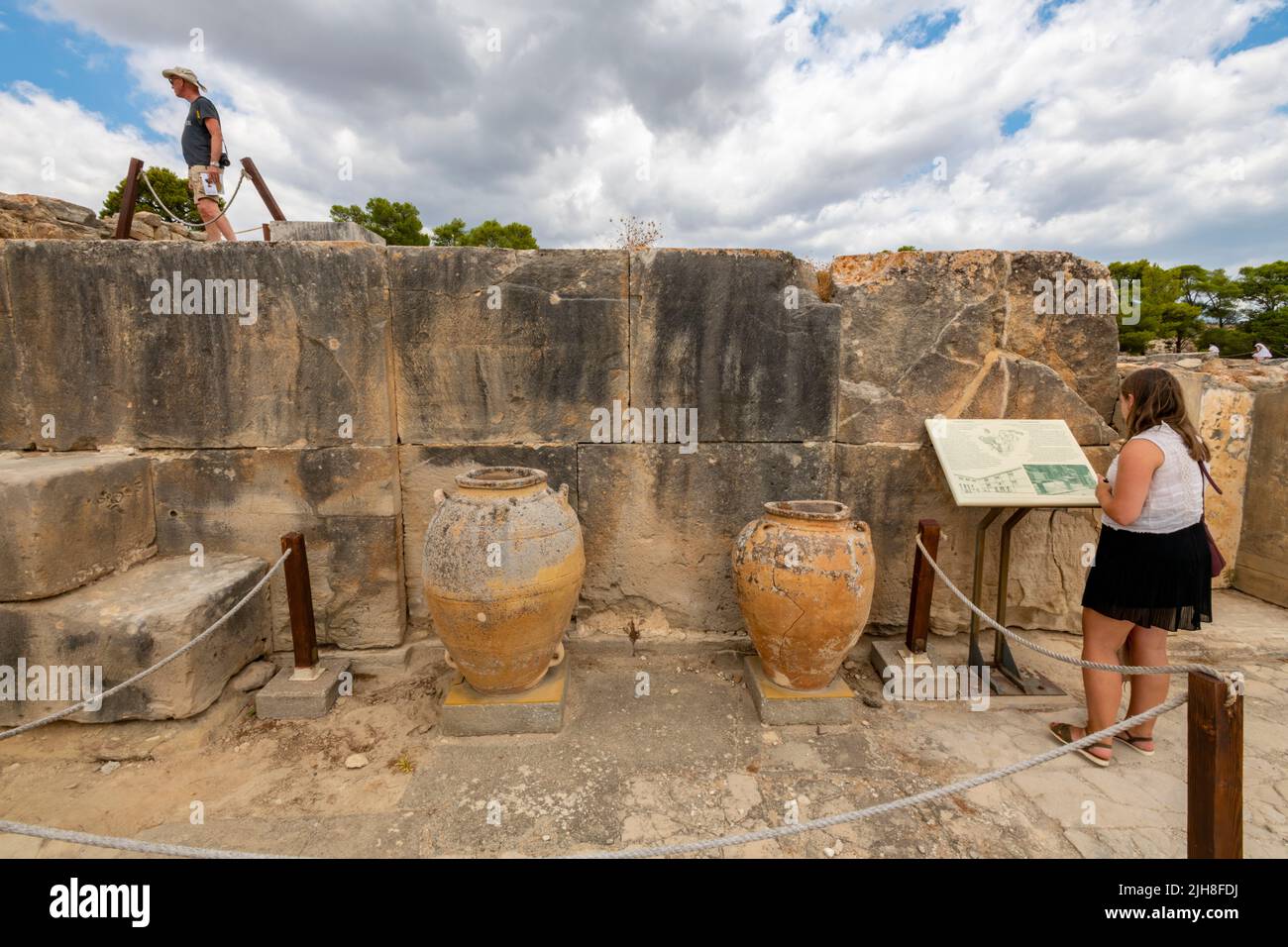 visitors to the ancient greek minoan site of the old temple at knossos on the cretan island of ...
