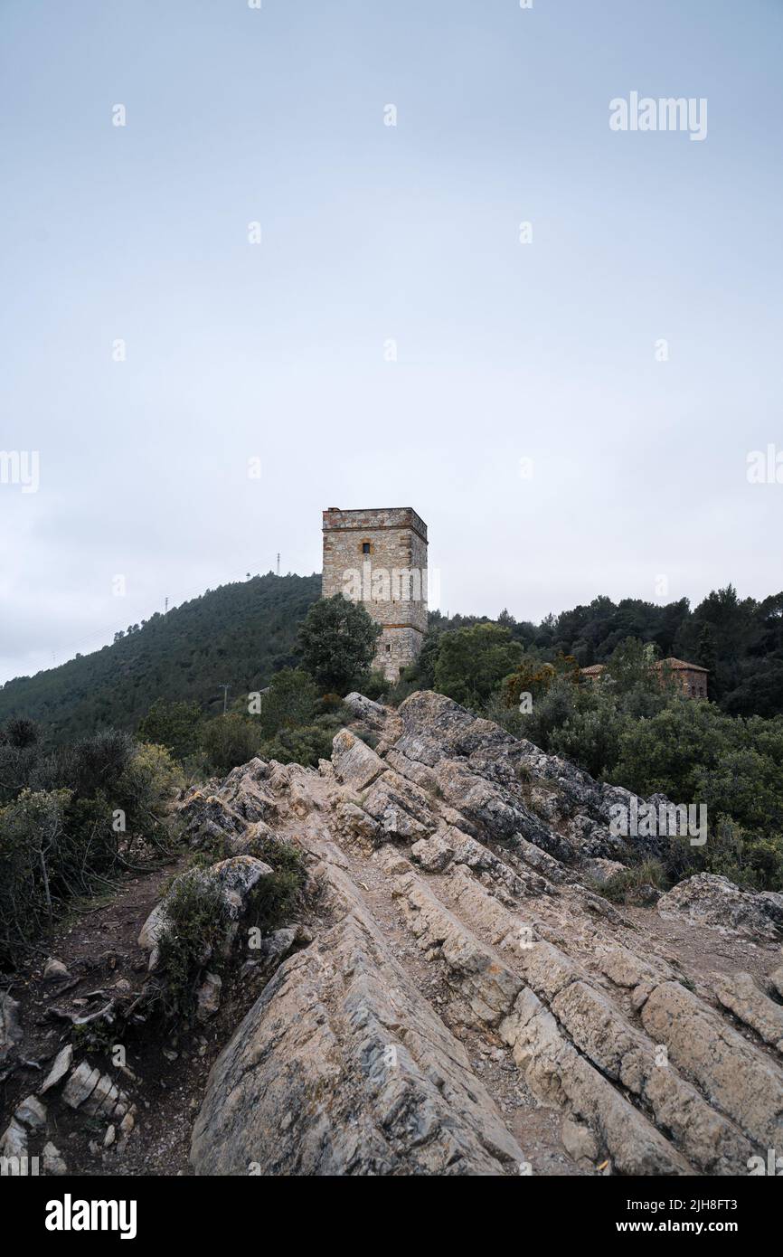 A beautiful shot of an old castle surrounded by mountains Stock Photo ...