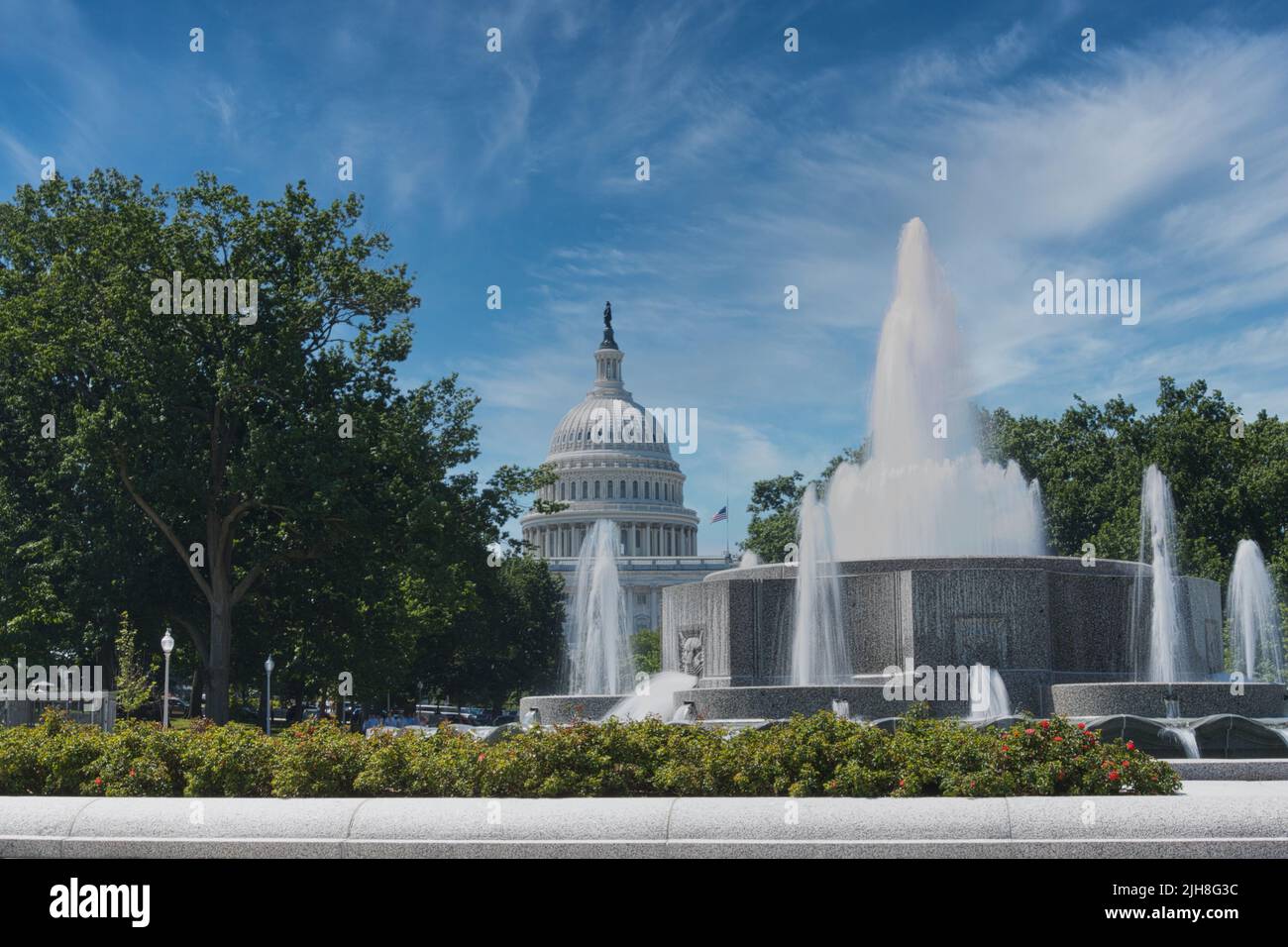 The water fountains against the United States Capitol building on a ...