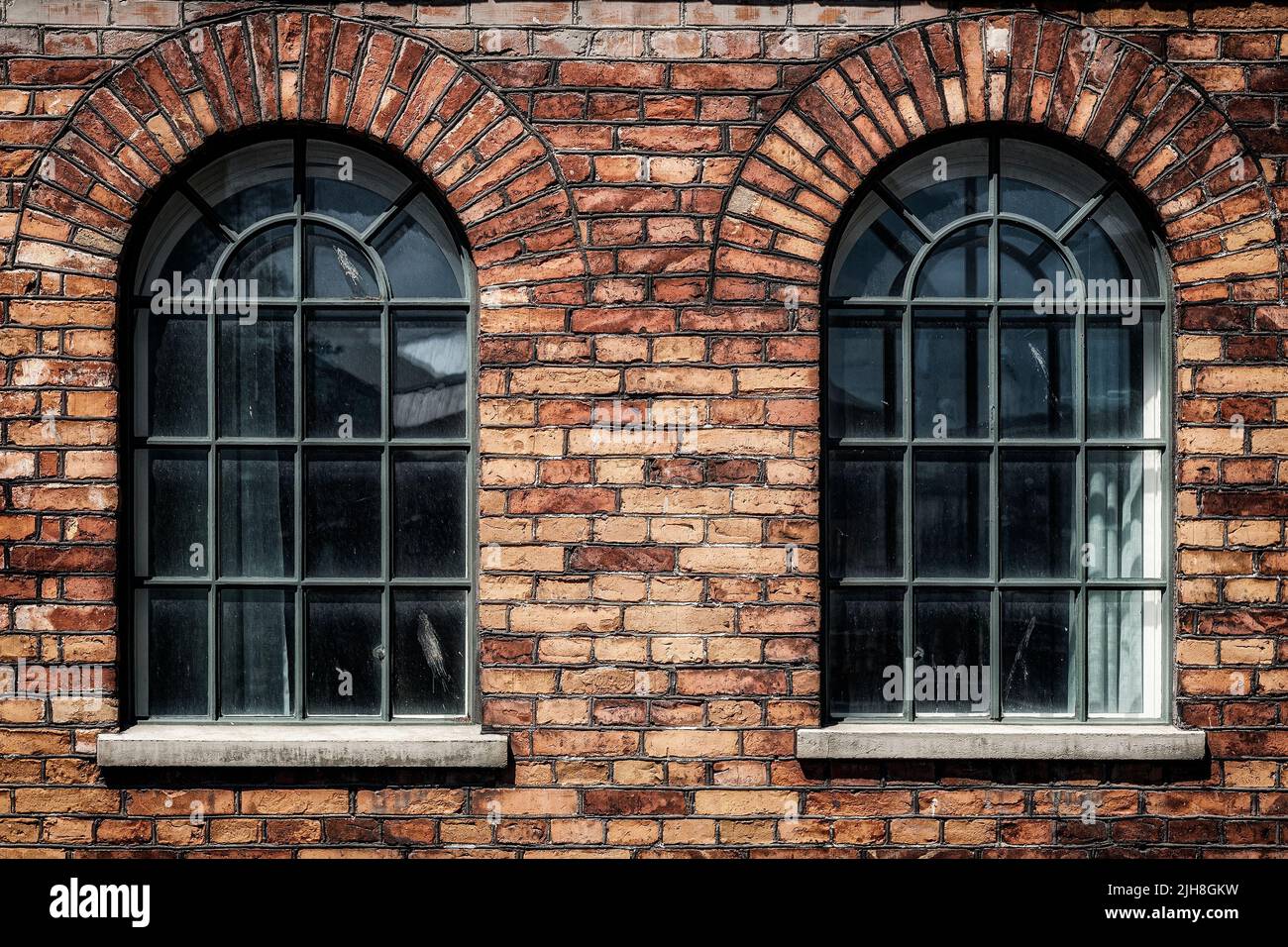 Arched windows two arched windows hi-res stock photography and images ...
