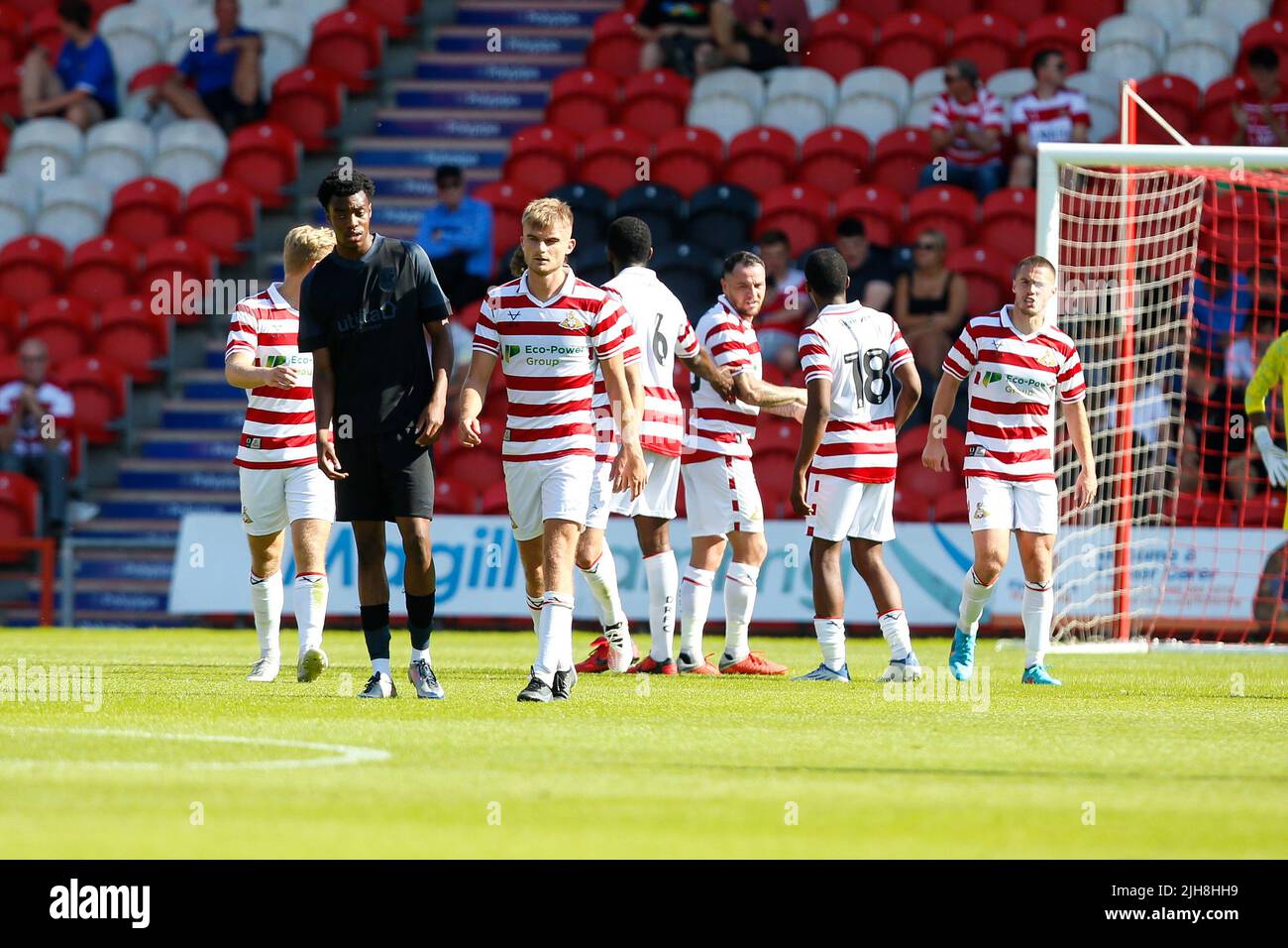 Players of Doncaster Rovers celebrate scoring a goal to make it 1-0 ...