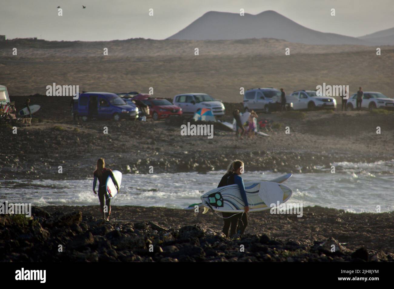 A wide desert field with canyons and mountain Stock Photo - Alamy