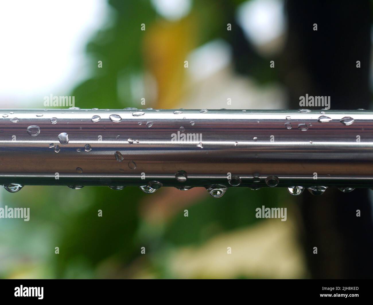 raindrops on the iron fence Stock Photo - Alamy