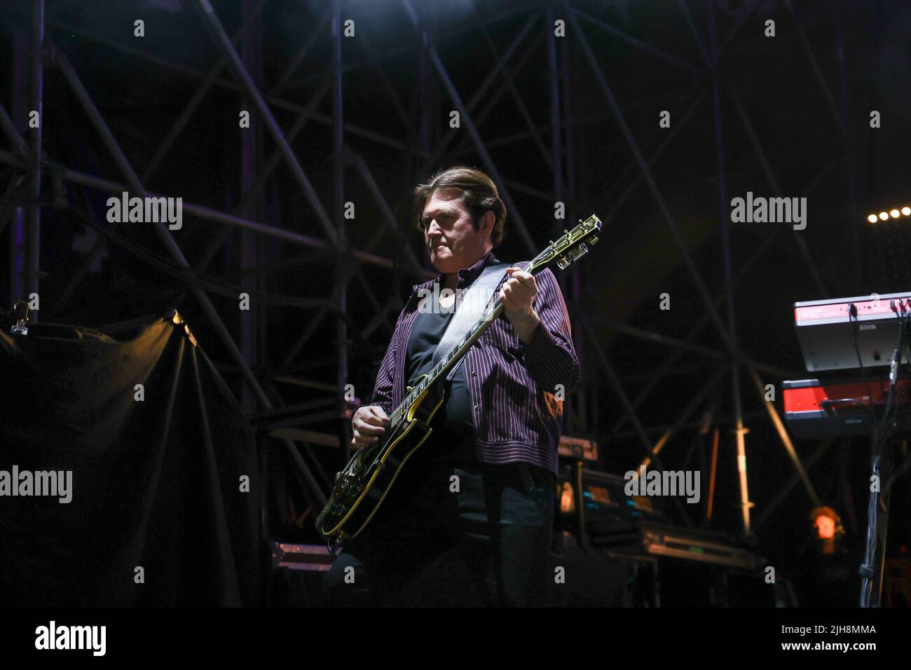 Charlie Burchill ,guitar during the Music Concert Simple Minds - 40 ...