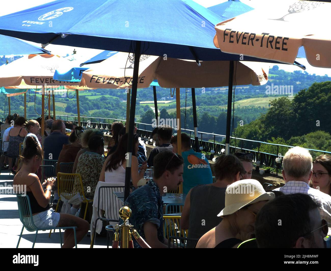 Taking the shade beneath table brollies visitors to the famous Clifton ...
