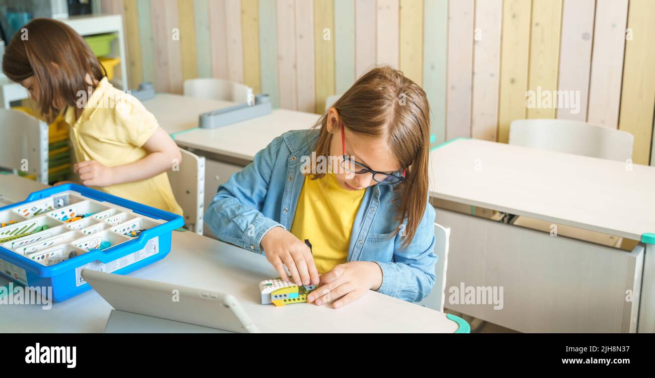 Programming work, learning robotics in elementary school. Children ...