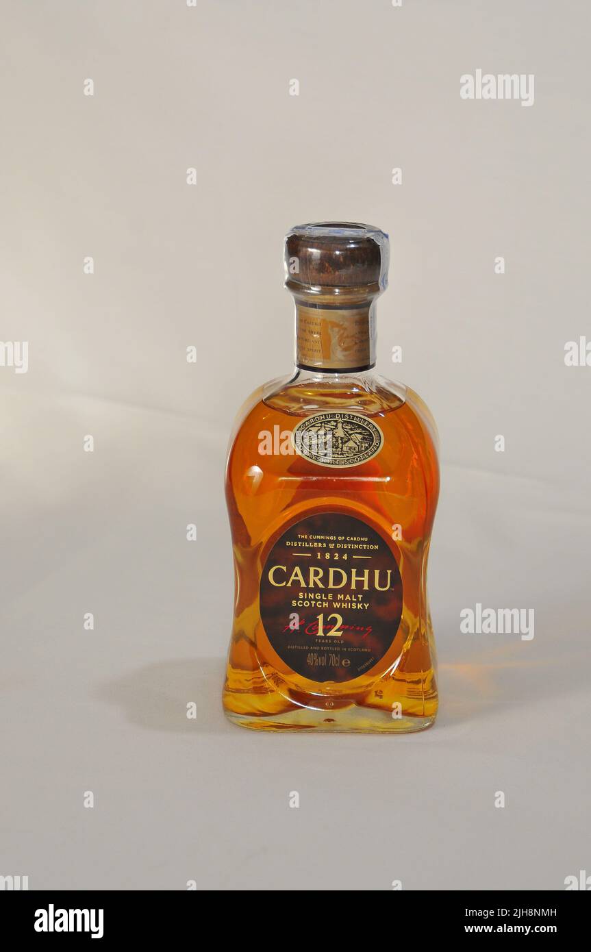 A vertical shot of a bottle of Cardhu scotch whisky in a studio in a ...