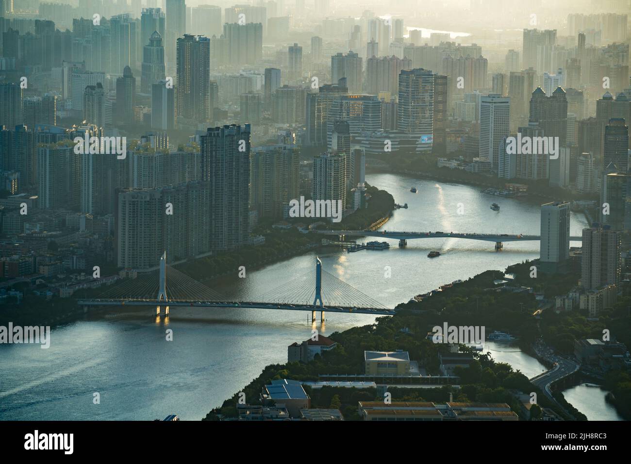 An aerial view of high-raised buildings in a city on a foggy day Stock ...