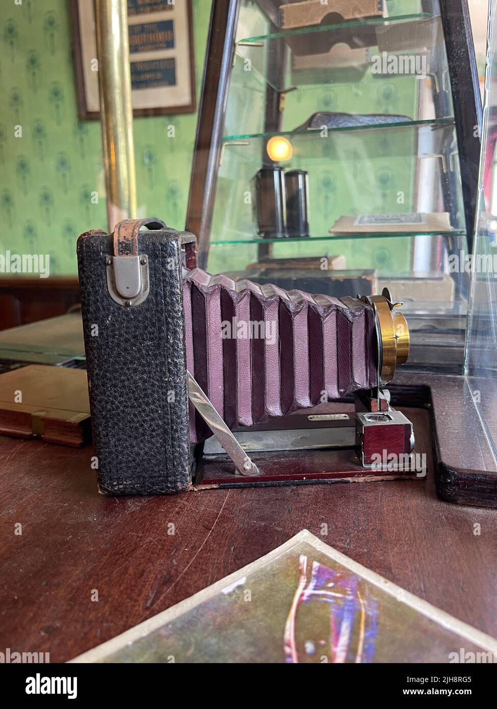 A vintage camera on an old table in the museum Stock Photo - Alamy