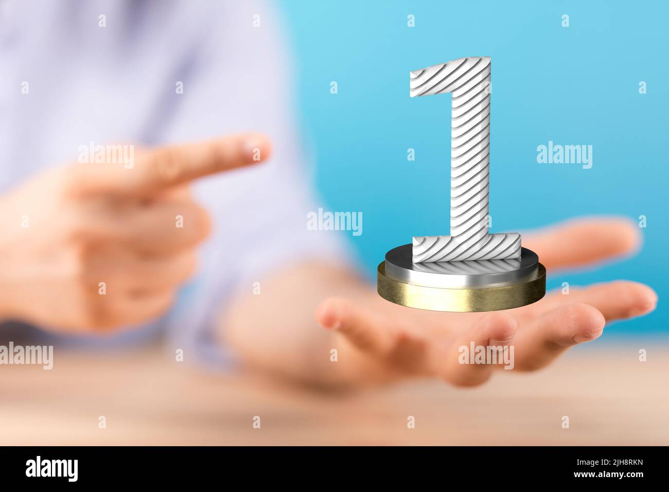 A man holding a digital floating first place prize celebration logotype ...