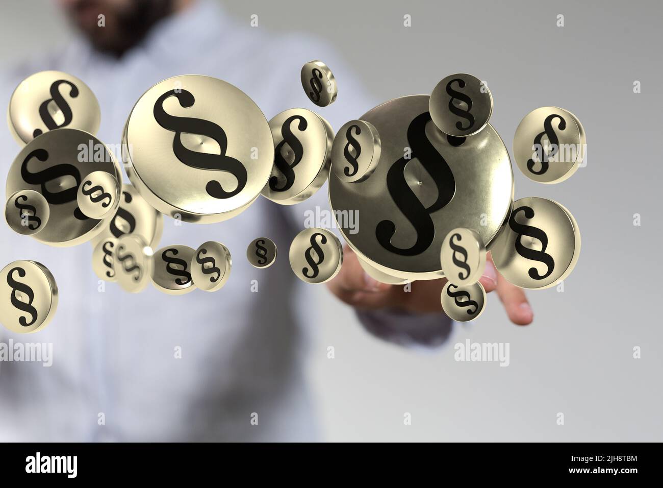 A man touching a floating render of the paragraph signs Stock Photo - Alamy