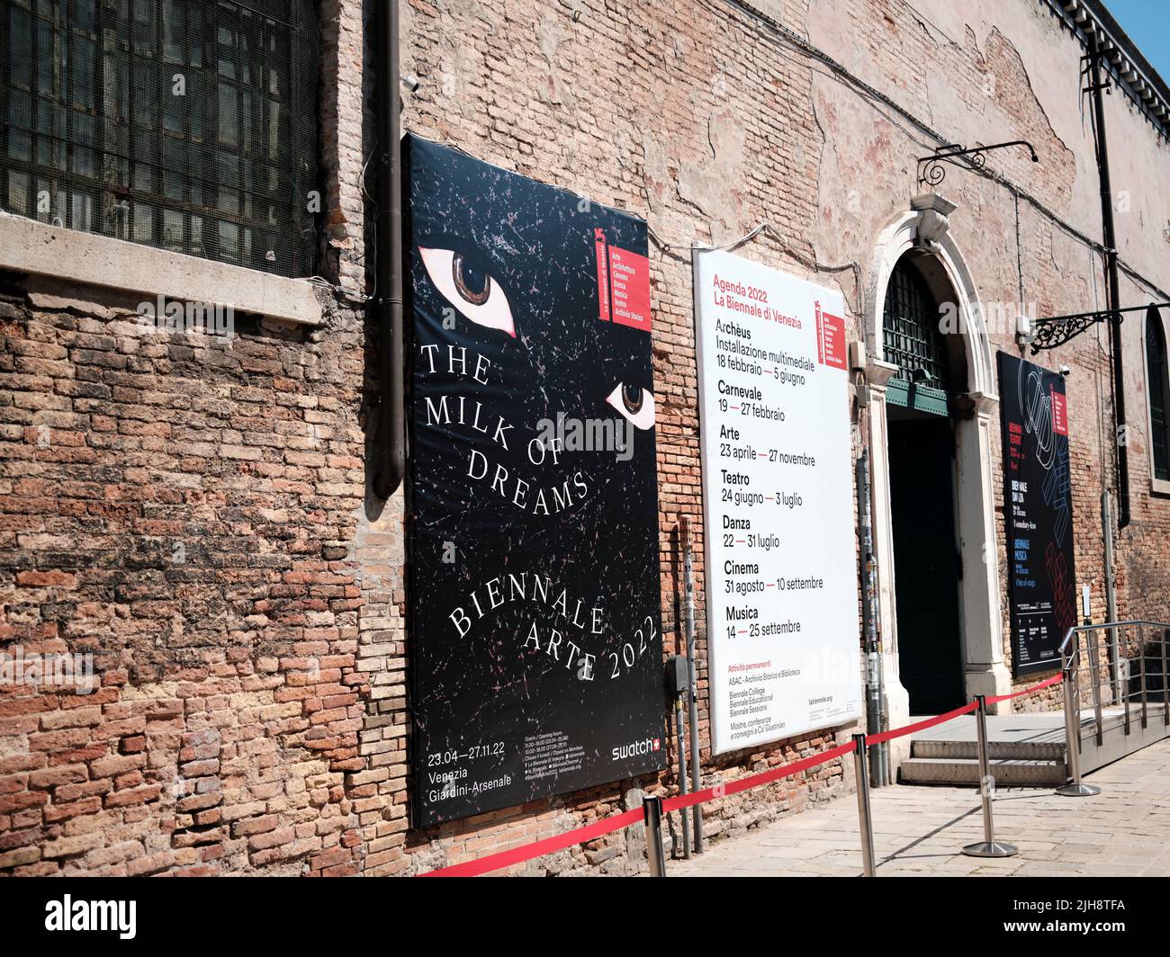 A number of posters on walls during the 59th Venice Biennale ...