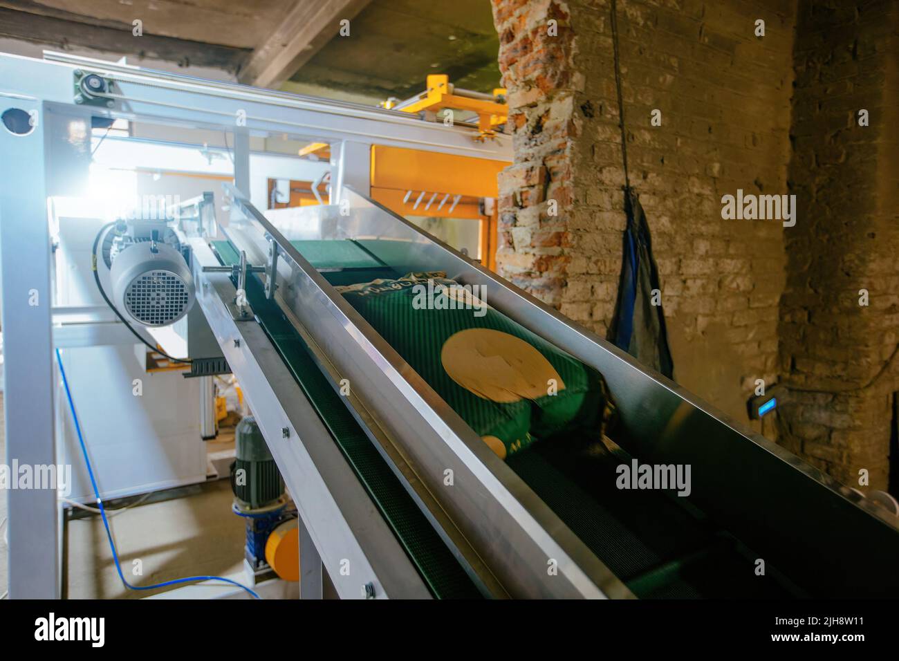 Cement packaging, bagging and stacking machine Stock Photo - Alamy