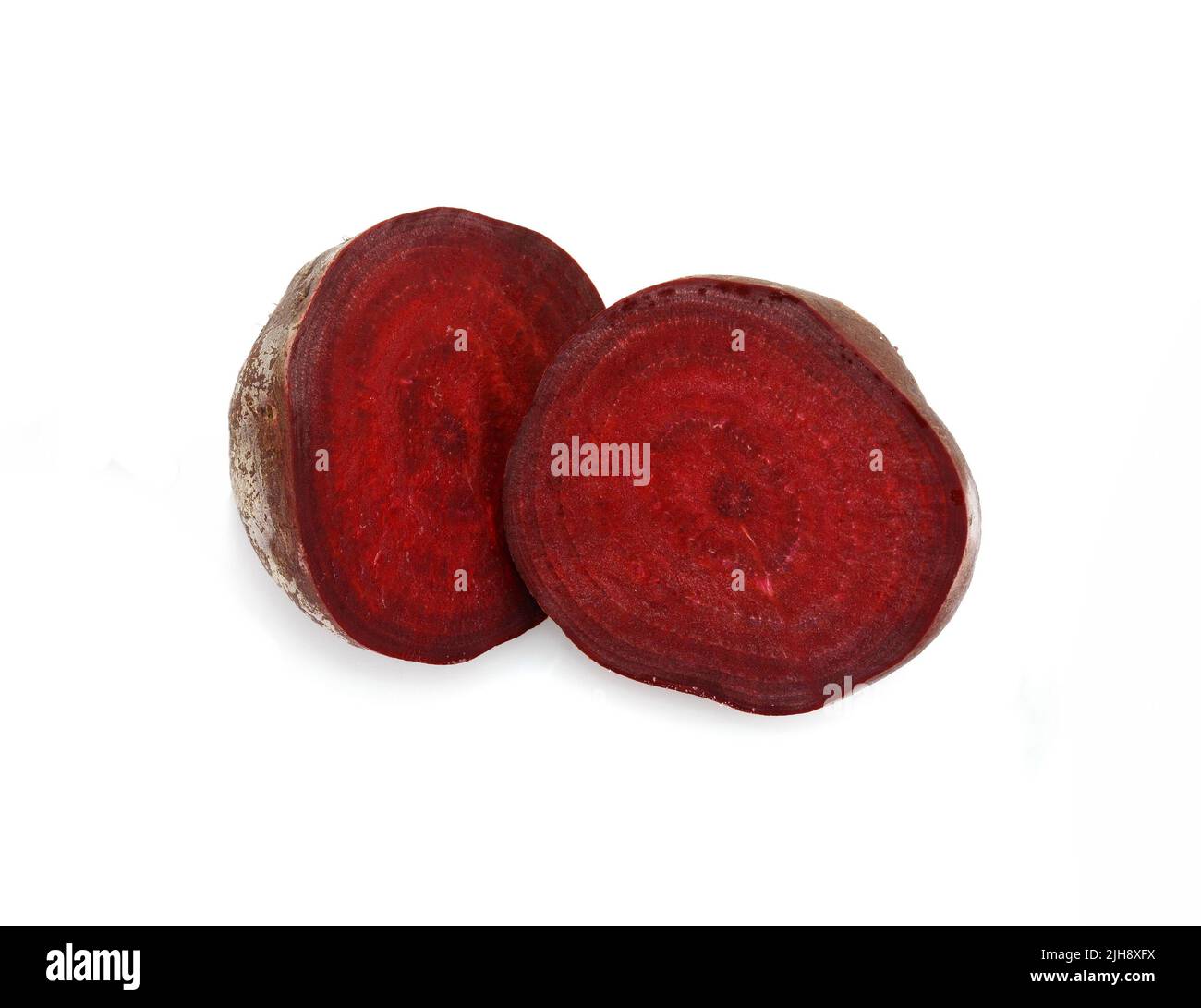 Half red beet roots isolated on white background Stock Photo - Alamy