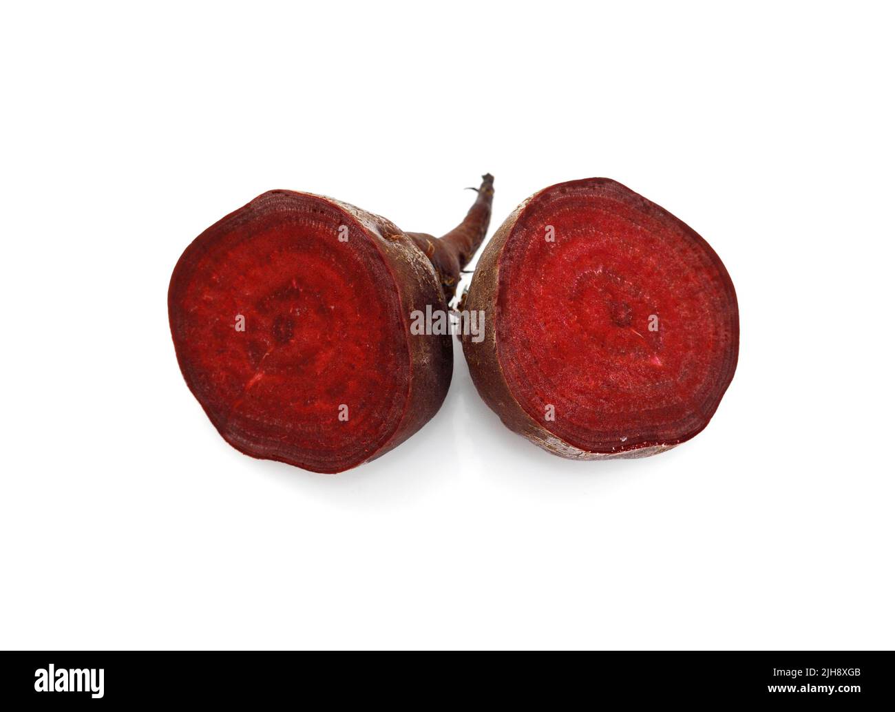 Half red beet roots isolated on white background Stock Photo - Alamy
