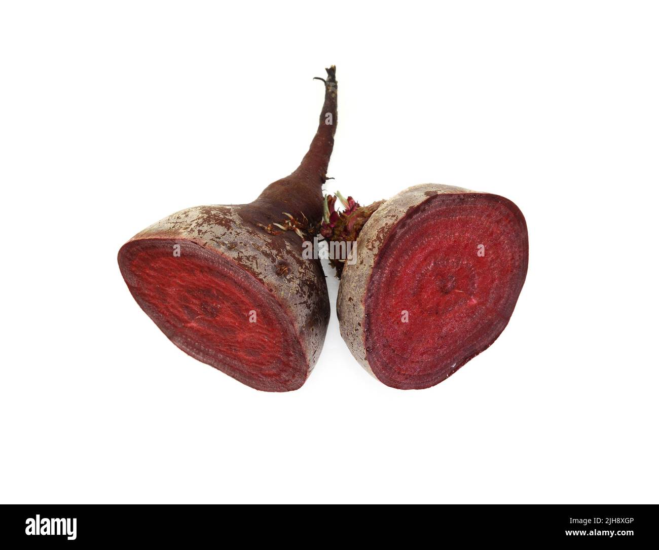 Half red beet roots isolated on white background Stock Photo - Alamy