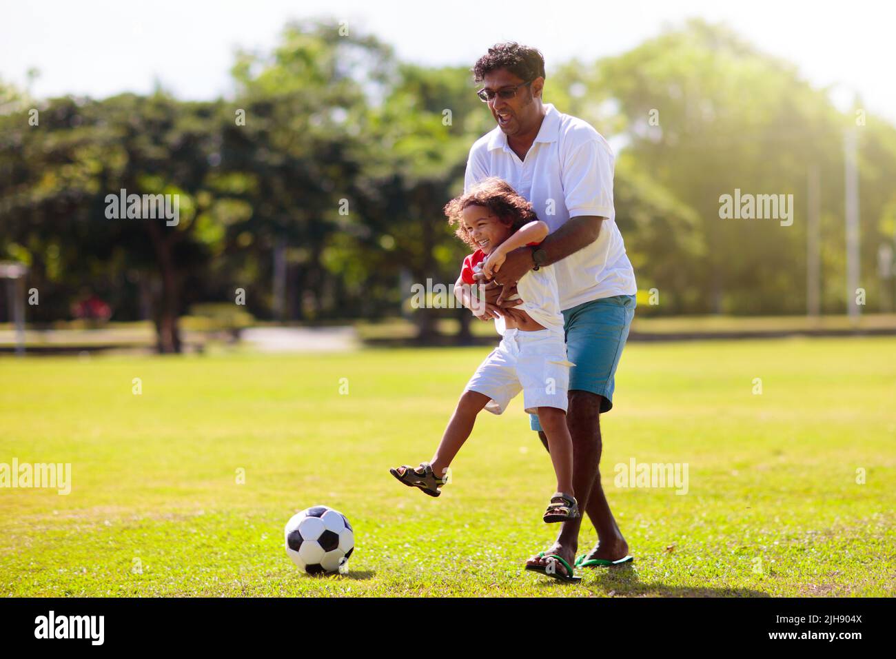 Father and son at football stadium hi-res stock photography and images ...