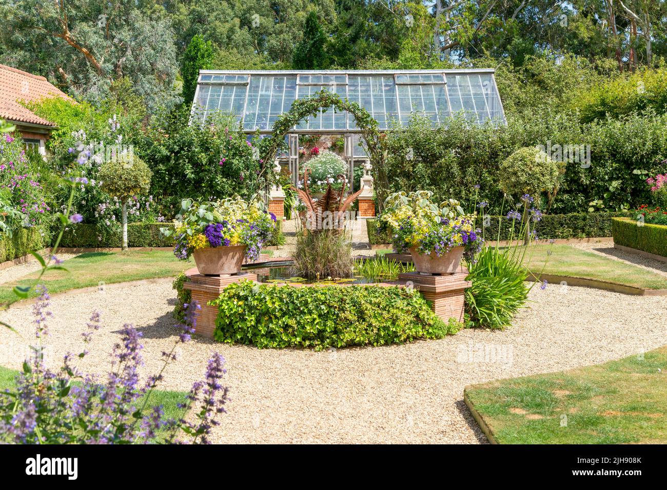 Greenhouse in Glasshouse Garden, East Ruston Old Vicarage garden, East Ruston, Norfolk, England ...