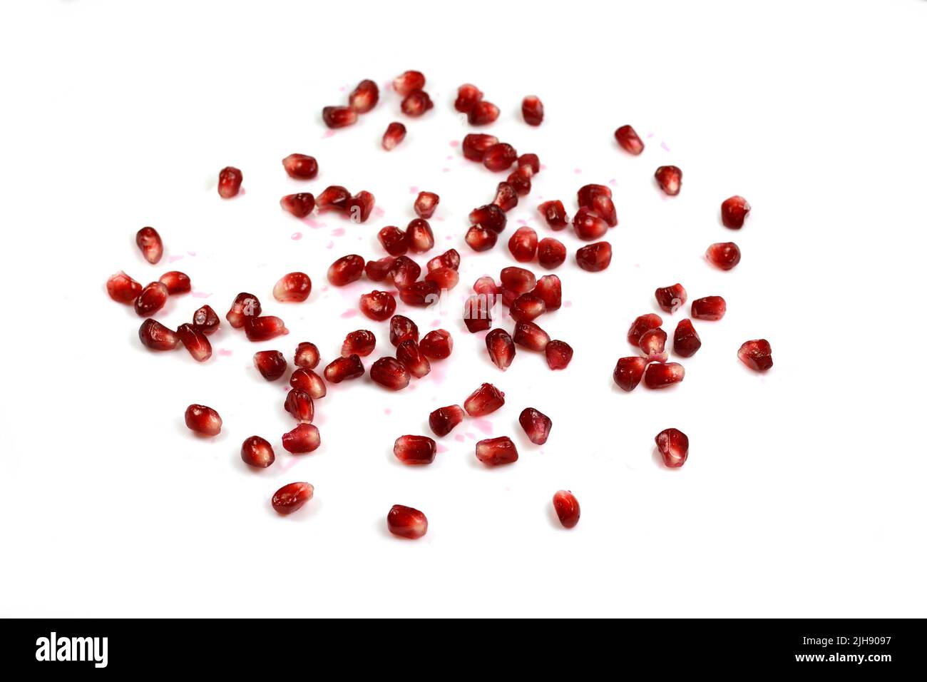 pomegranate seeds isolated on white background. pomegranate berries ...