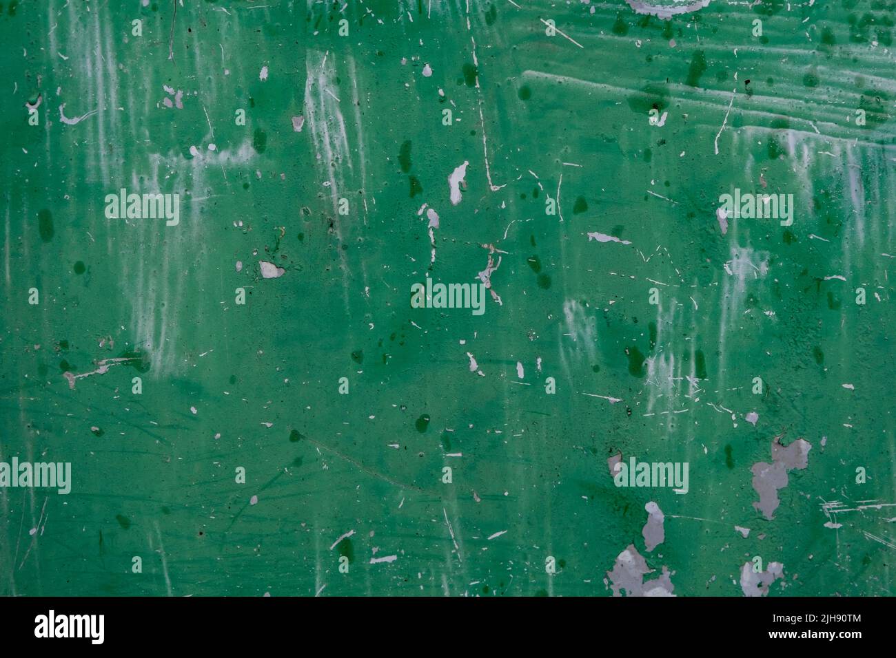 Green painted old metal sheet grunge background Stock Photo - Alamy
