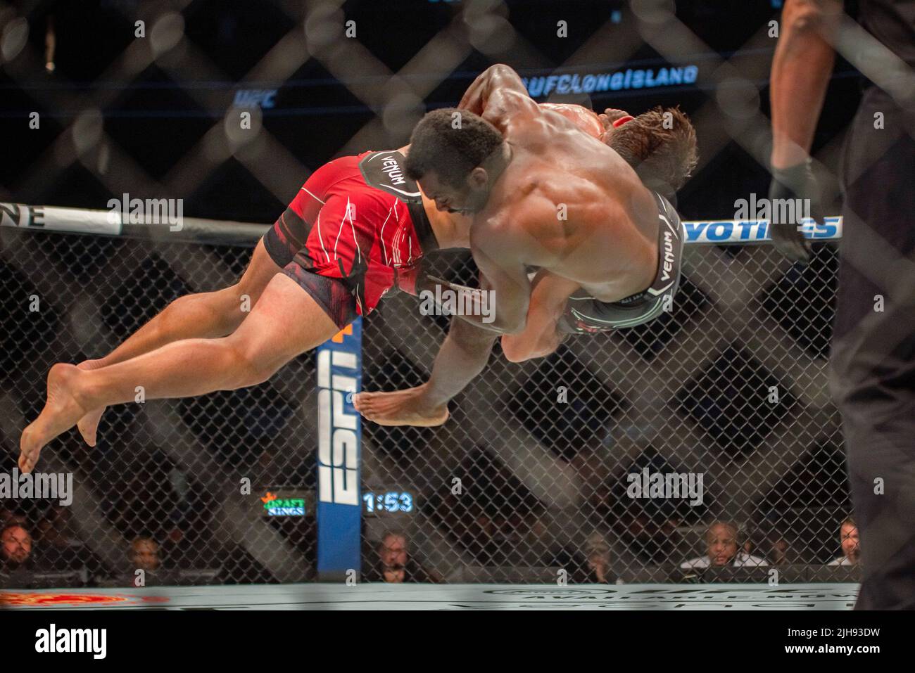 LONG ISLAND, NY - JULY 16: (L-R) Dustin Stoltzfus takes down Dwight ...