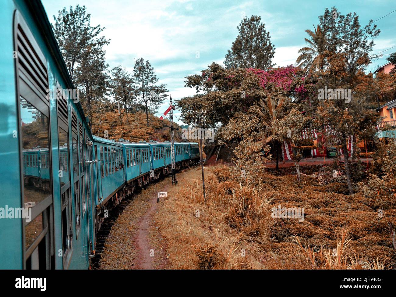 A train traveling on the Badulla Colombo railway line Stock Photo - Alamy