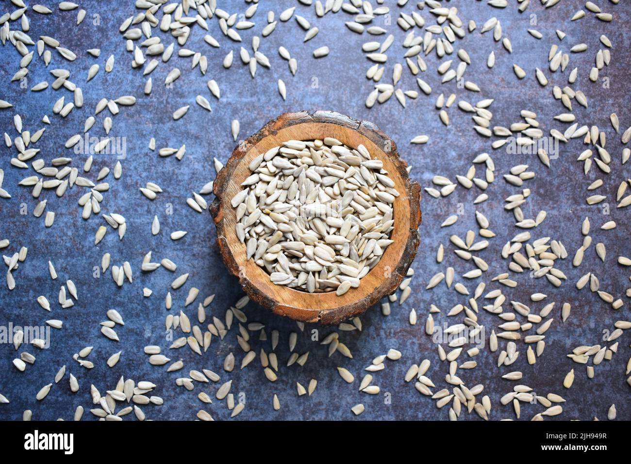 Raw whole dried hulled sunflower seeds Stock Photo - Alamy