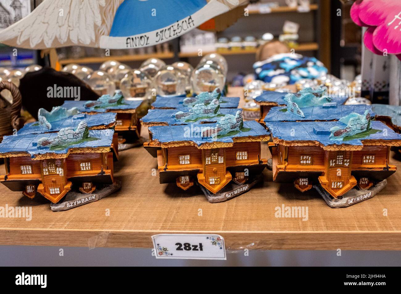 Szymbark, Poland. 12th July, 2022. Mini upside down house souvenirs ...