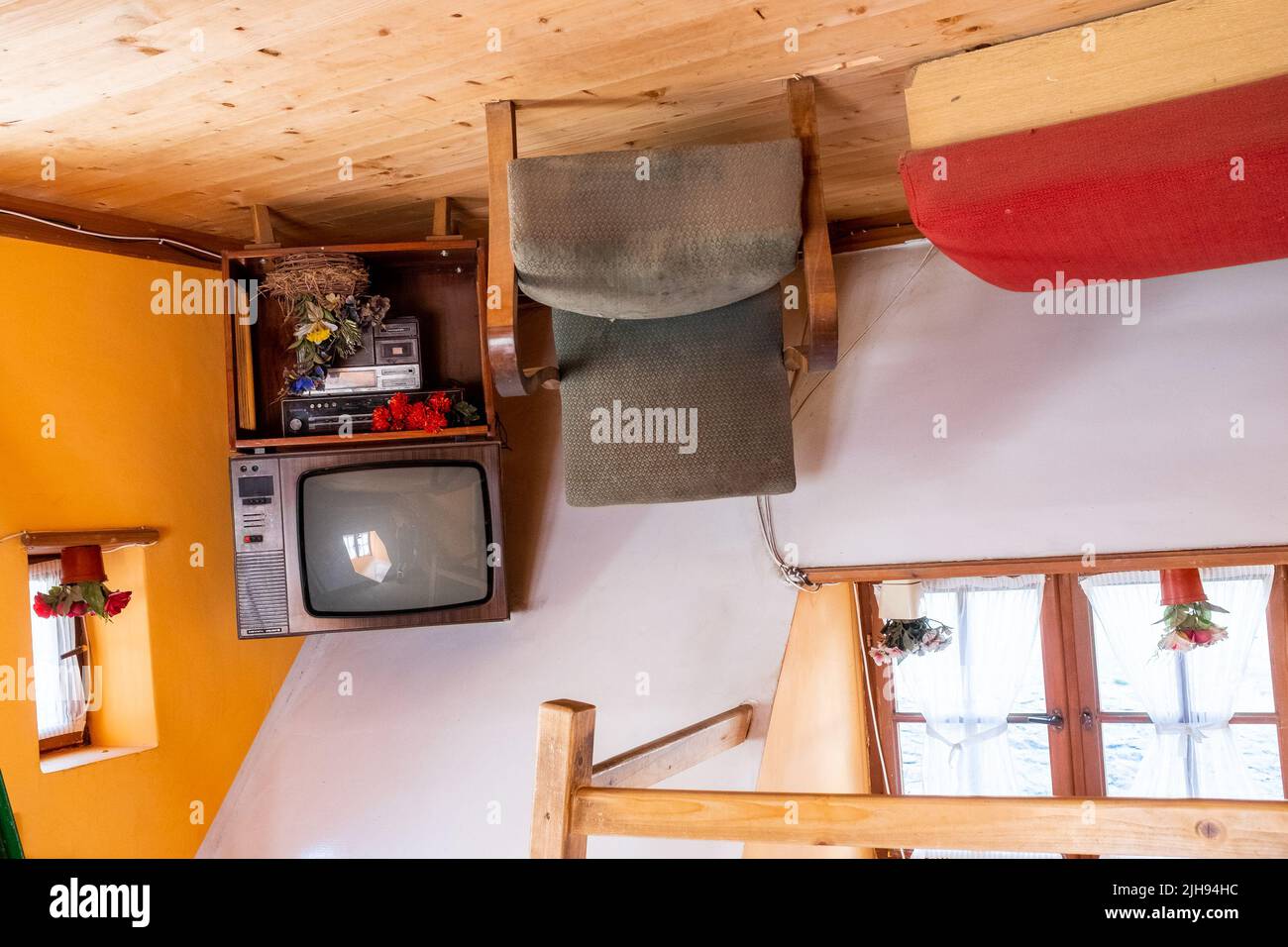 Szymbark, Poland. 12th July, 2022. Interior view of an upside down house in Szymbark. With in ...