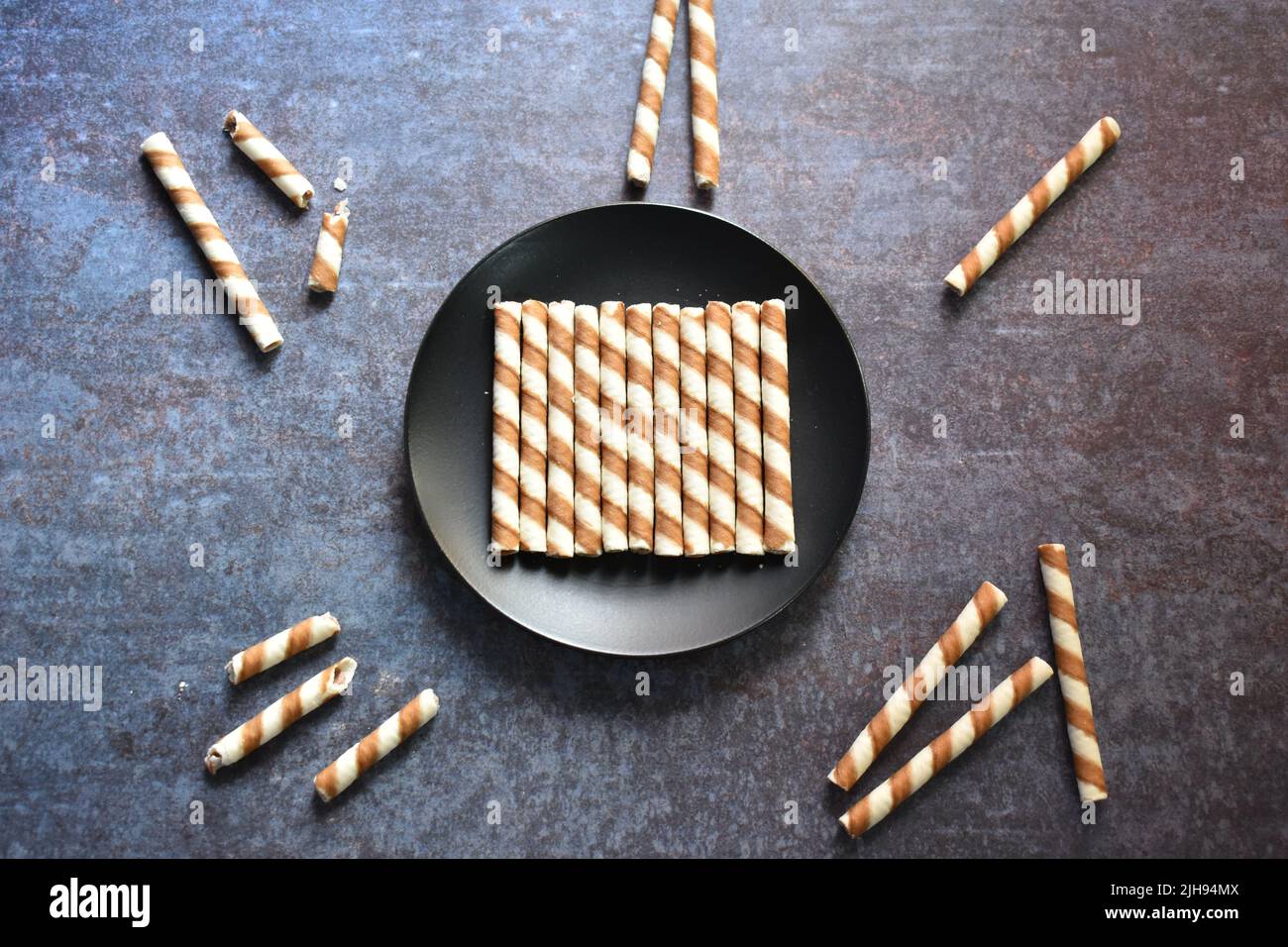 Crunchy fresh wafer roll cookie Stock Photo - Alamy