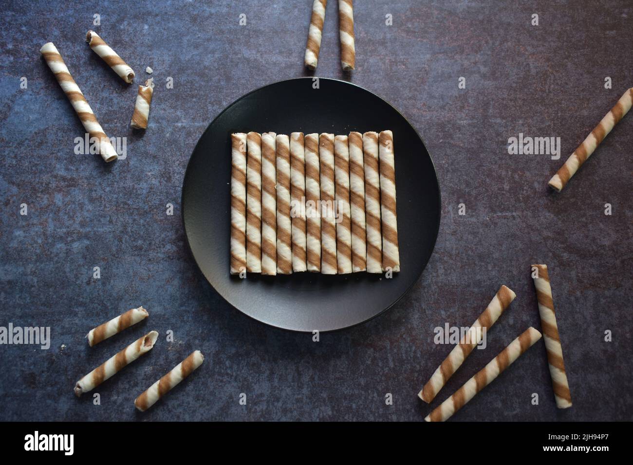 Crunchy fresh wafer roll cookie Stock Photo - Alamy