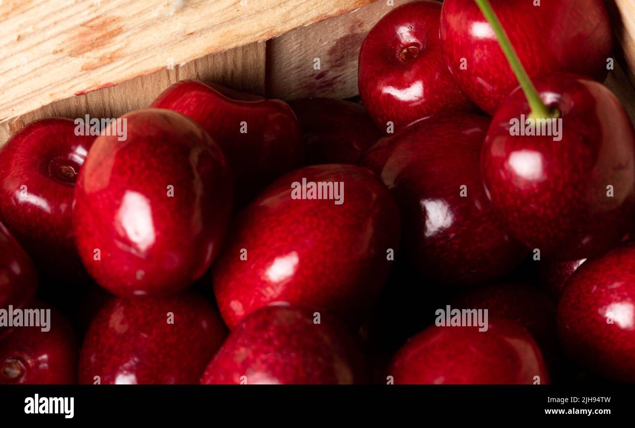 Red juicy sweet cherries. Juicy maroon fruit close-up. Cherries in ...