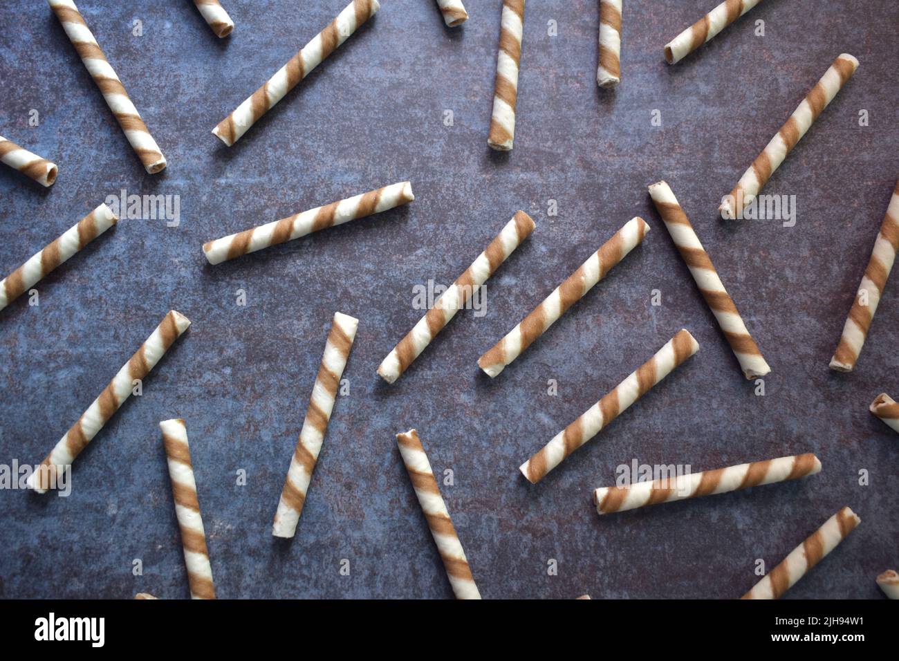 Crunchy fresh wafer roll cookie Stock Photo - Alamy
