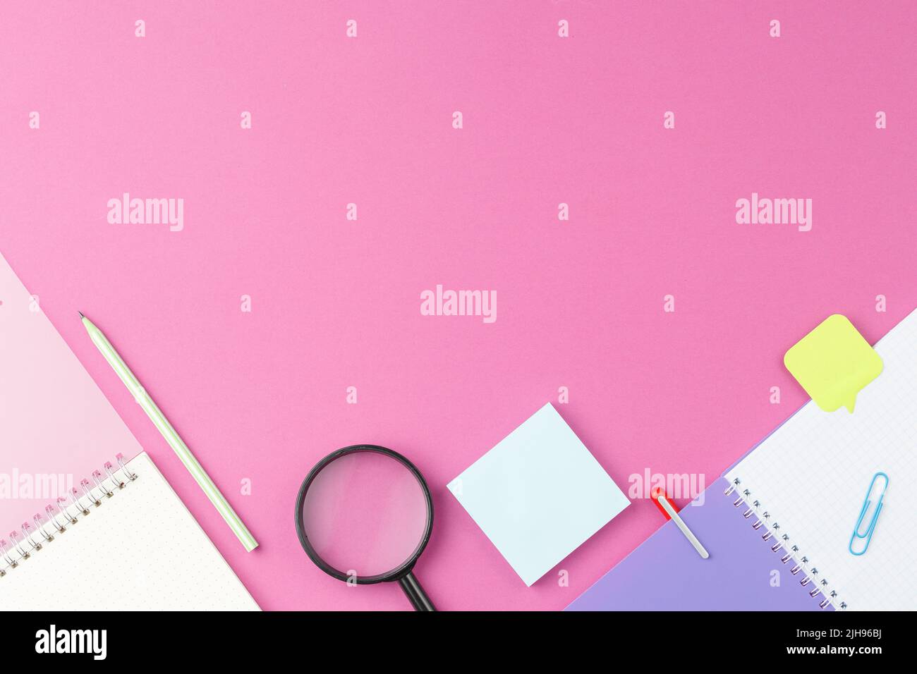 Spiral notepad with stationery on the desk Stock Photo - Alamy