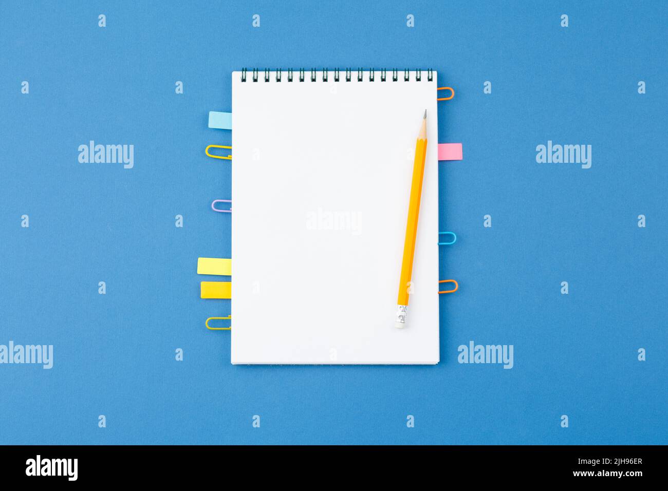 Notepad with bookmarks paper clip, note sheets Stock Photo - Alamy