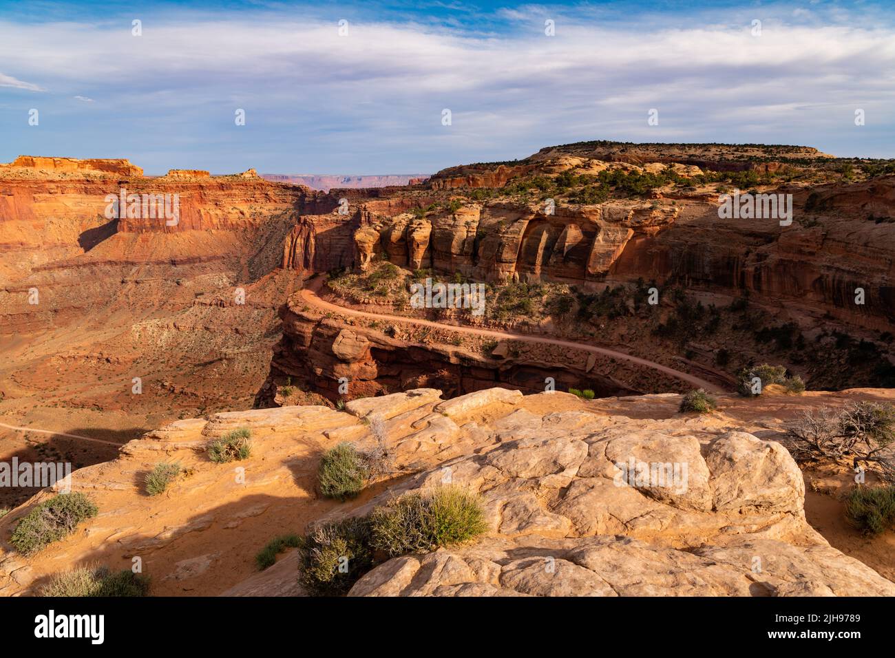 The 4WD Shafer Trail in curves high above Shafer Canyon through a ...